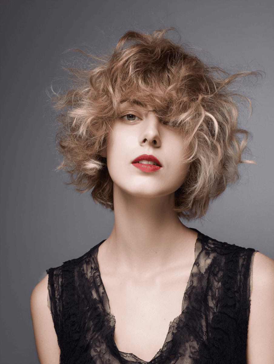 22 Cute Layered Bob Haircuts for Curly Hair That Add Shape and Bounce