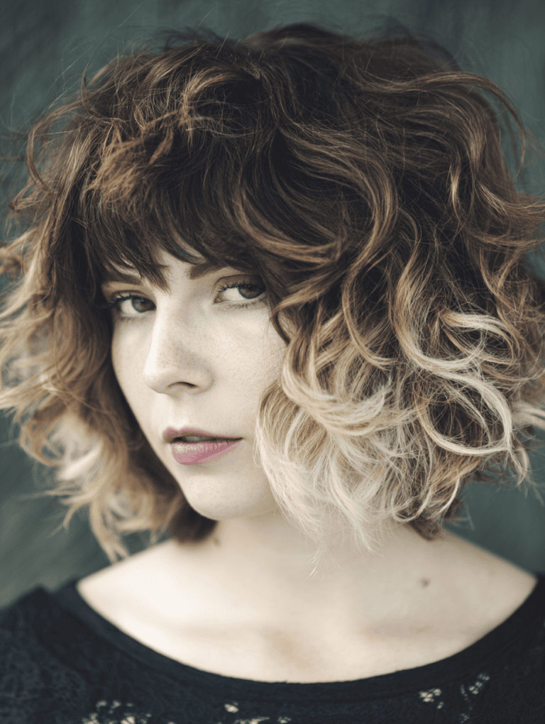 22 Cute Layered Bob Haircuts for Curly Hair That Add Shape and Bounce