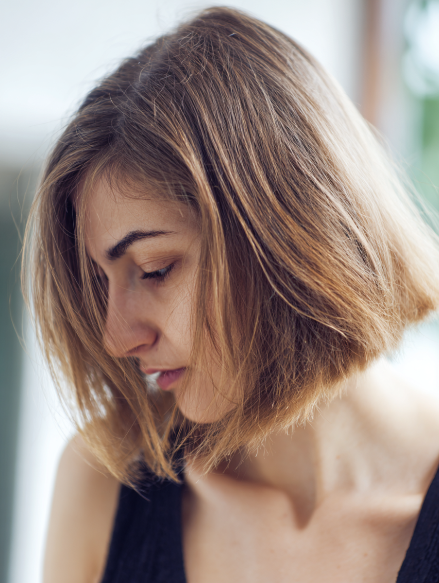 24 Low Maintenance Haircuts for Frizzy Hair That Stay Smooth Longer